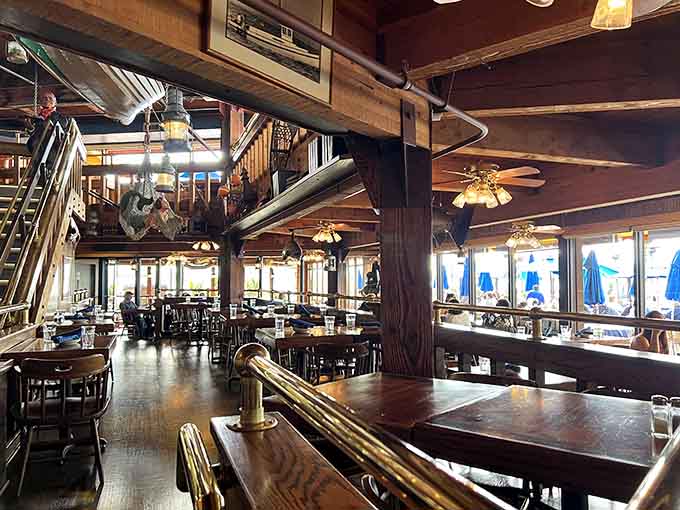 Multi-level dining with a suspended boat overhead &ndash; because why should gravity limit your decorating options or dining adventures?