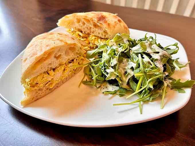 Golden ciabatta stuffed with vegetables and served alongside peppery arugula makes you reconsider everything you thought about sandwiches.