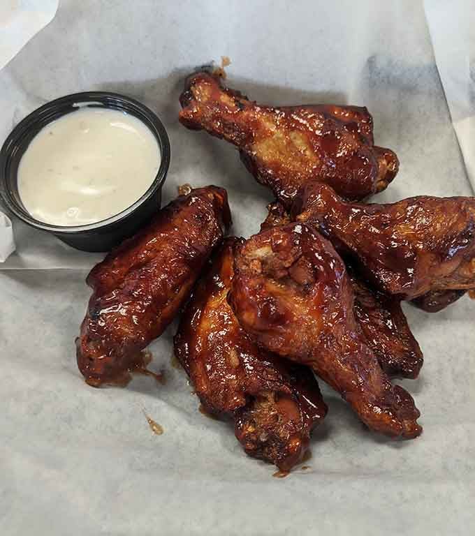 Wings glazed to glossy perfection, ready to test your willpower and your supply of wet naps simultaneously.