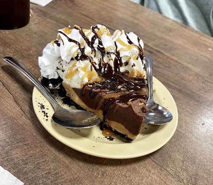Peanut butter pie topped with whipped cream and chocolate drizzle is worth saving room for, trust me.
