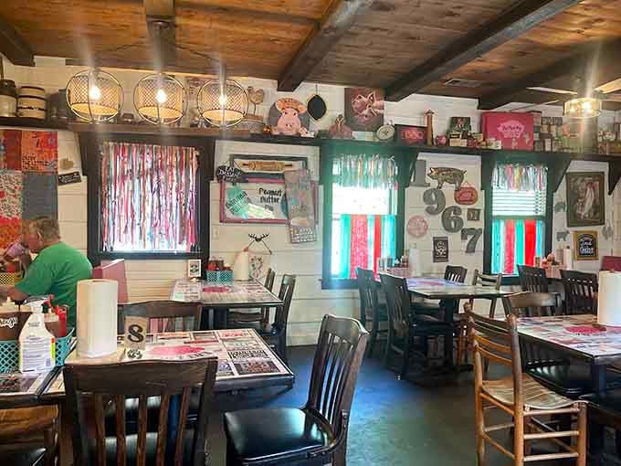 Rustic wooden ceilings and cozy seating where strangers become friends over plates of smoky goodness.