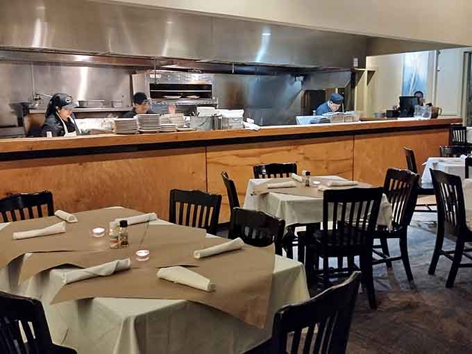 The open kitchen lets you watch the culinary magic happen, because transparency in cooking builds trust and anticipation equally.