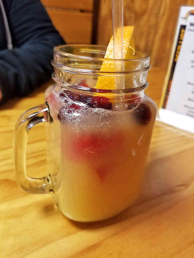 Mason jar beverages with fruit garnishes make you feel fancy even when you're eating fried seafood in flip-flops.