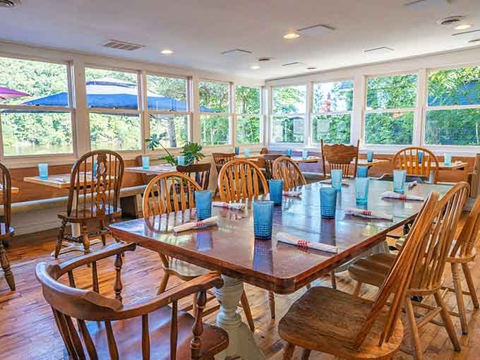 Large windows flood the dining room with natural light, making every meal feel bright and welcoming here.