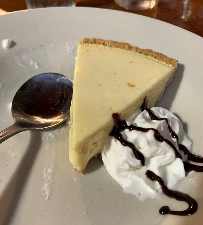 Sour orange pie with whipped cream is the kind of dessert that makes you plan your next visit immediately.