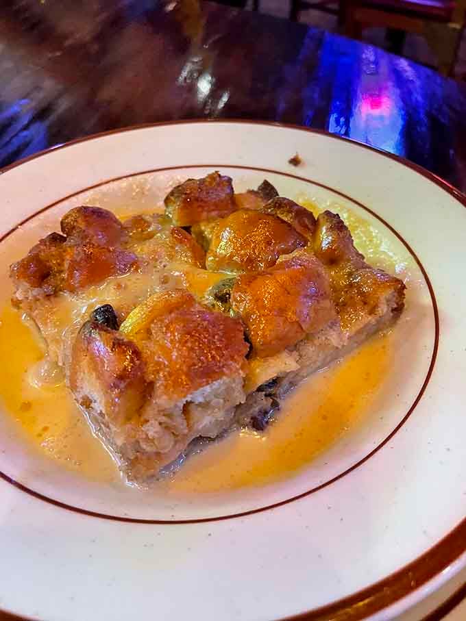 Bread pudding emerges golden and glistening, the kind of dessert that makes you reconsider your relationship with carbohydrates.