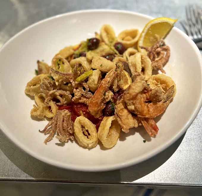 Crispy calamari done right, proving this mountain kitchen knows its way around seafood from any coast or ocean.