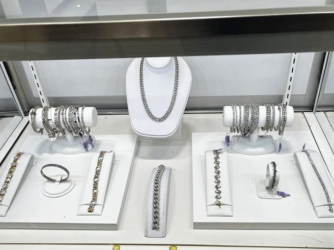 Silver chains and bracelets sparkle with possibility, each piece a small treasure waiting to adorn someone new and appreciative.