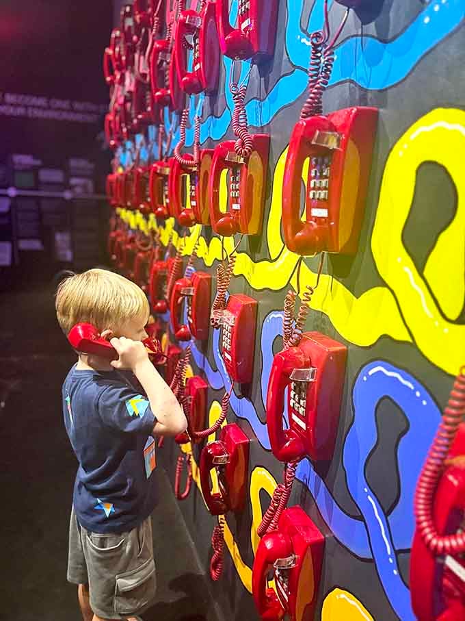 Remember when phones had cords? This nostalgic wall of vintage receivers invites conversations with the past and present simultaneously.
