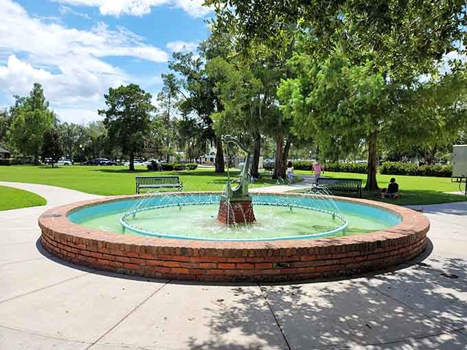 That fountain knows the secret to happiness: bubbling water, green grass, and absolutely nowhere urgent to be.