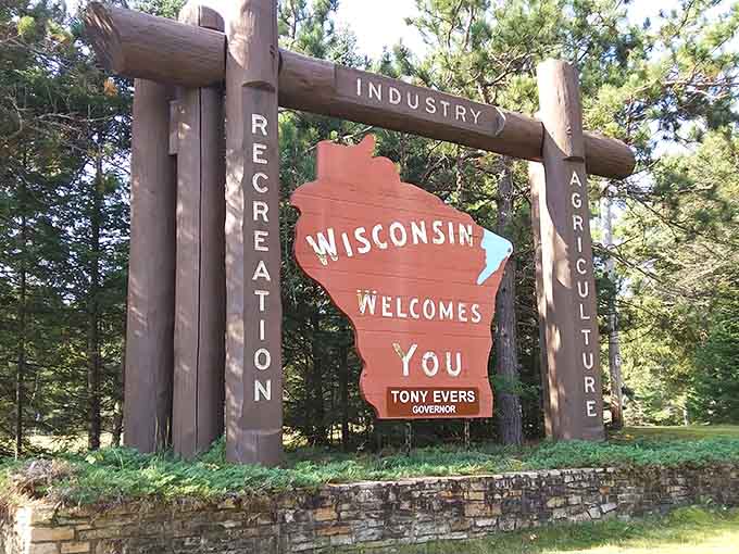 Surrounded by towering pines, this northern entry point feels like stepping into a postcard from up north.