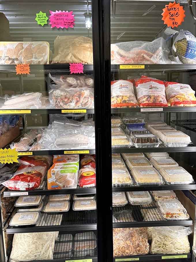 The refrigerated case reveals rows of baked treats waiting for their forever homes.