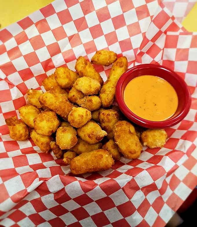 Golden cheese curds with dipping sauce are Minnesota's love letter to fried dairy, and we're here for it.