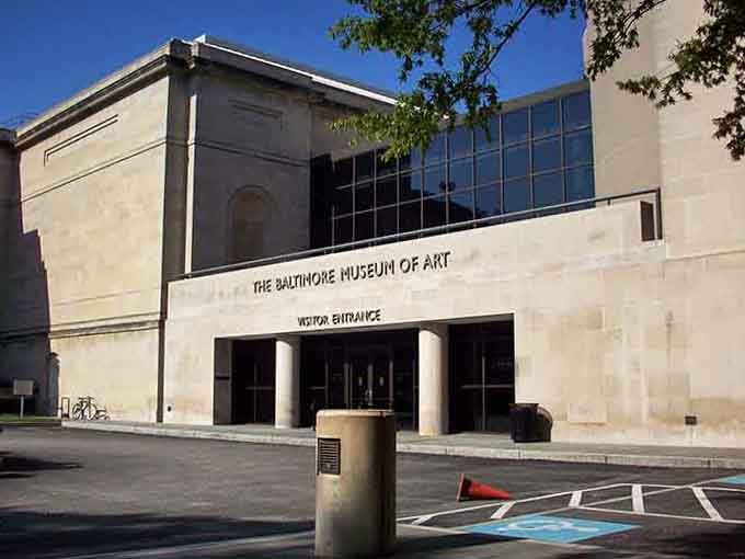Modern museum entrance welcomes art lovers with clean lines and open spaces, promising treasures inside without charging admission for inspiration.