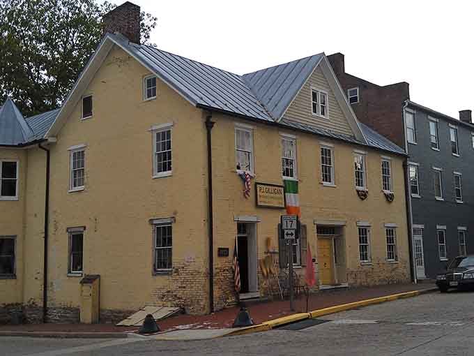 Cobblestone streets climbing gently uphill where every step takes you deeper into authentic small-town America.