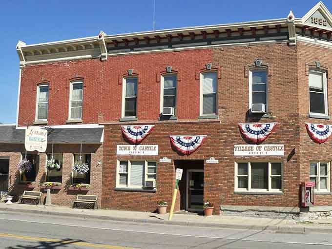Patriotic bunting decorates this brick beauty where small-town pride and community spirit are always in season year-round.