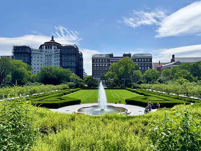 Perfectly trimmed hedges and dancing fountains create formal European elegance right in the heart of Central Park's greenery.