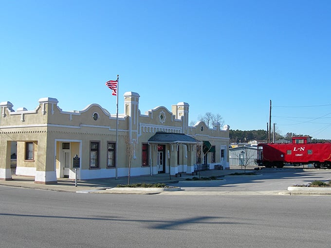 That vintage depot charm mixed with a bright red caboose creates pure Americana you can't fake.