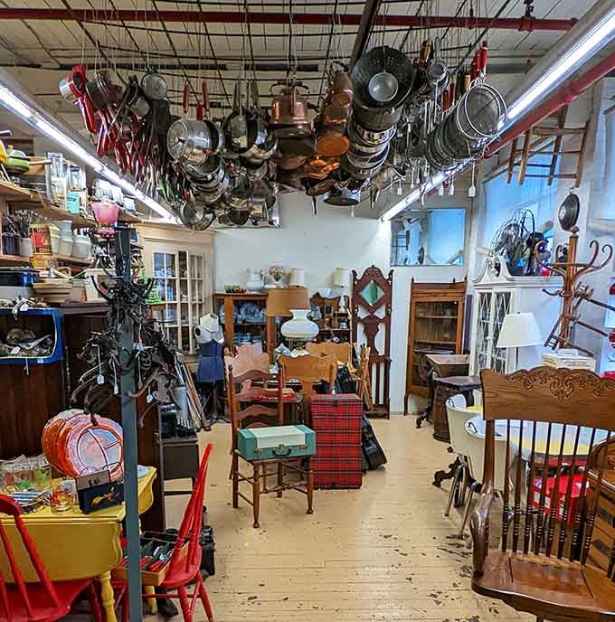 Hanging pots and timeless furniture make this vintage space feel packed with character and hidden stories.