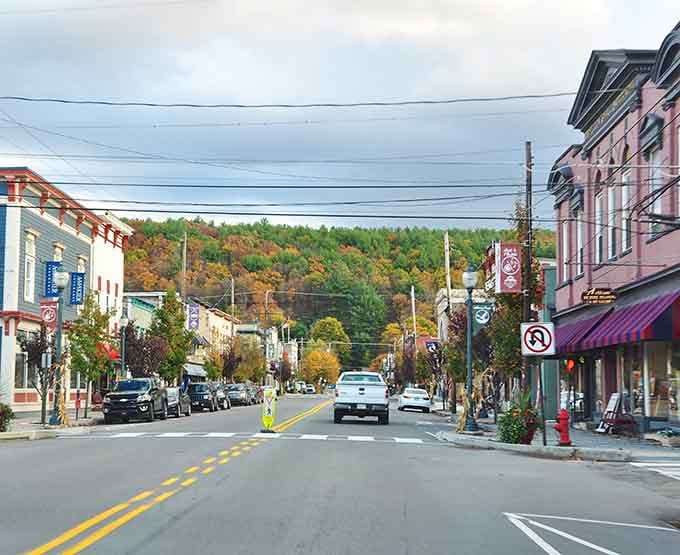 Forested hills frame this main street view, reminding you that nature's never far away in Pennsylvania's small towns.