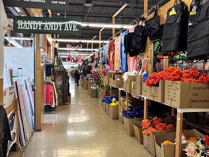 Handy Andy Avenue beckons shoppers down corridors bursting with artificial flowers bright enough to cheer any rainy day.