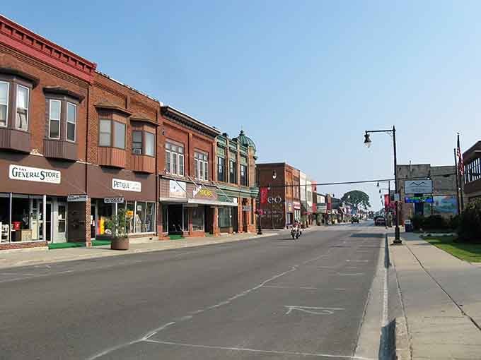 Historic facades in warm brick tones create a streetscape that feels timeless yet totally within budget.