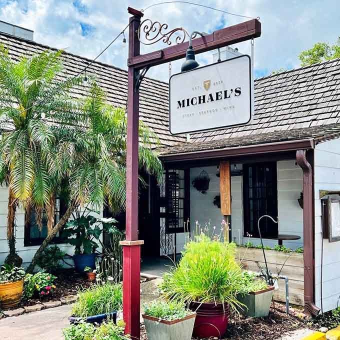 Lush landscaping and charming cottage architecture make this steakhouse feel like a secret garden discovery.