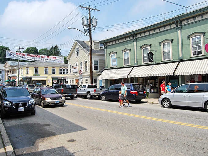 Pastel storefronts and striped awnings create a Main Street that feels both artsy and approachable.