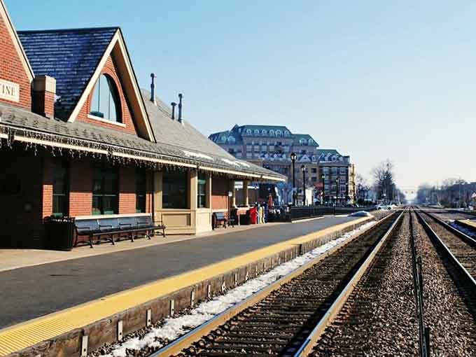 The classic train station platform stretches toward Victorian architecture that whispers of journeys past and adventures ahead.