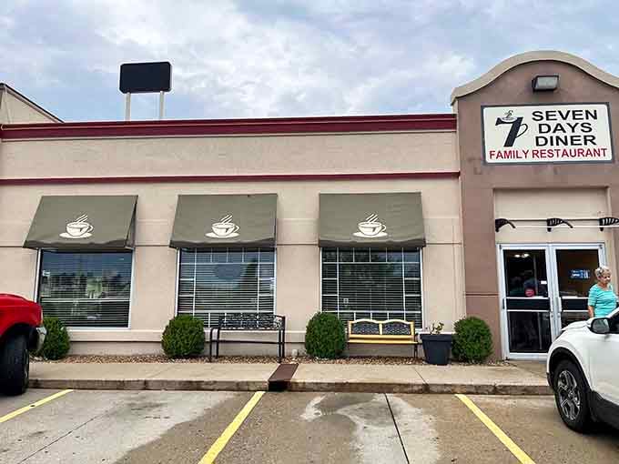 Clean lines and coffee cup awnings signal a reliable spot where breakfast is taken seriously seven days a week.