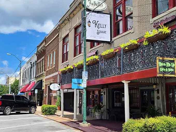 Kelly Square's ornate ironwork balconies and cheerful flower boxes create a Main Street scene worth savoring slowly.