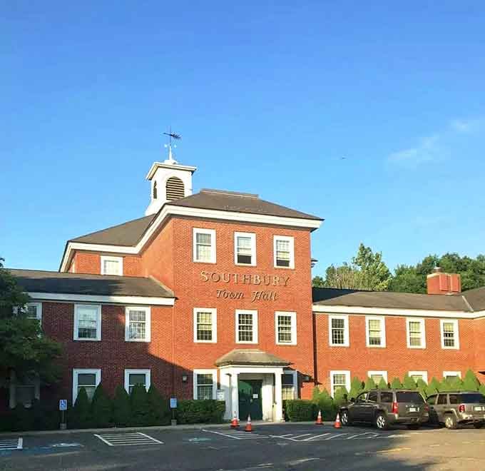 Southbury's town hall complex spreads out in welcoming red brick, ready to serve residents with New England efficiency.