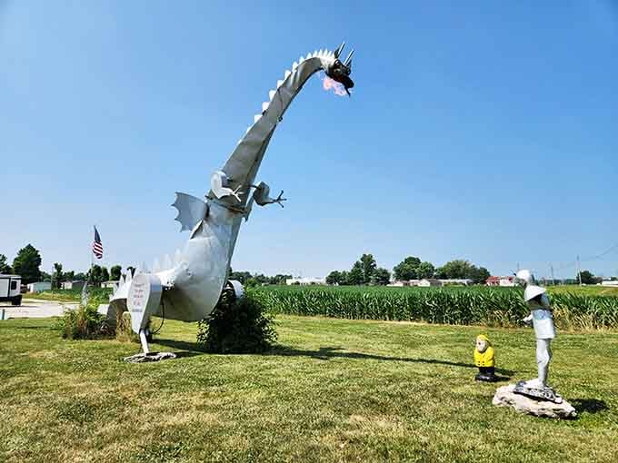 This fire-breathing dragon rears up dramatically against cornfields and blue sky, proving that roadside attractions can still surprise and delight.