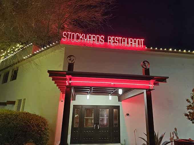 Red neon cuts through the night like a beacon calling all serious carnivores to this Phoenix institution.