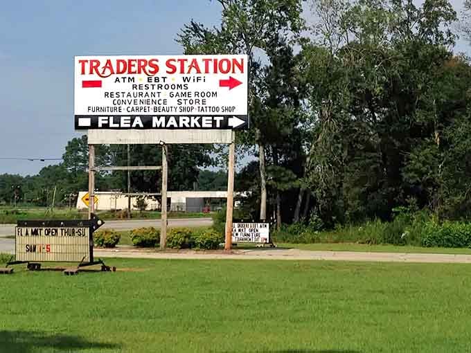 That roadside sign stands like a beacon for bargain hunters, promising everything from ATMs to antiques.