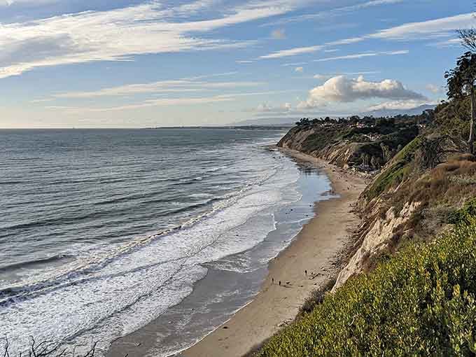 The coastline curves gently here, offering miles of uncrowded beach perfect for a peaceful stroll.