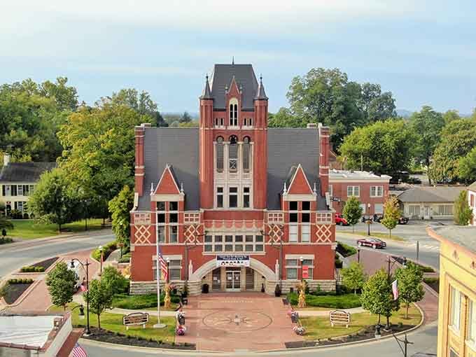 That magnificent courthouse anchors the town square with Victorian grandeur, standing proud as the community's architectural crown jewel.