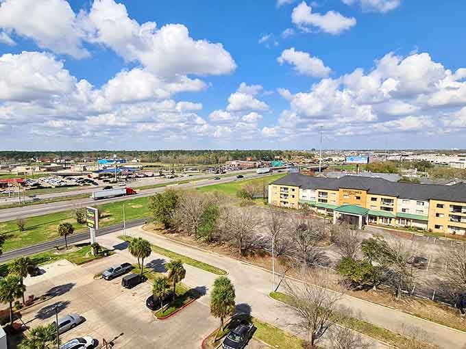 Golden hour light bathes the historic downtown in warm amber tones, where art deco buildings stand proud against a softening evening sky.