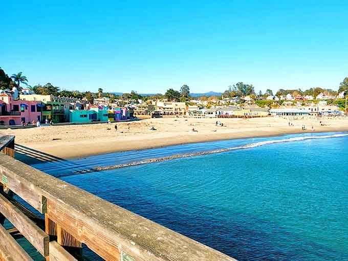 The pier stretches toward colorful buildings that prove beach towns don't have to take themselves too seriously.