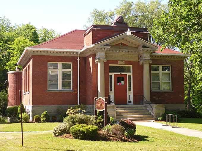 Classical columns and careful landscaping show that even the smallest library deserves architectural respect and community love.