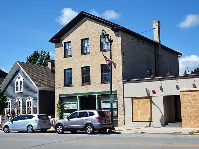 Cream-colored brick and black shutters give this building the timeless elegance of a place that values its heritage.