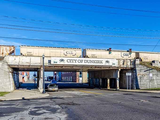 Railroad bridges frame the entrance to downtown like industrial gateways, reminding everyone that commerce once flowed through here constantly.