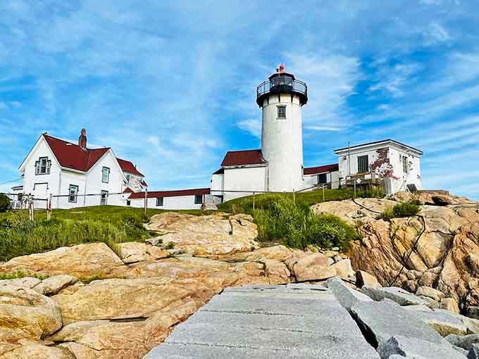 Summer's lush green grass surrounds the keeper's complex, making this historic station look fresh and inviting.
