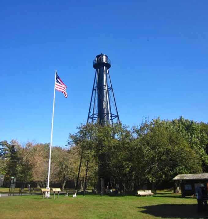 Old Glory waves proudly beside this metal framework marvel that proves lighthouses came in all shapes and sizes.