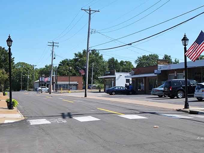 Wide crosswalks and classic streetlamps create safe, walkable spaces where nobody honks if you wave hello first.