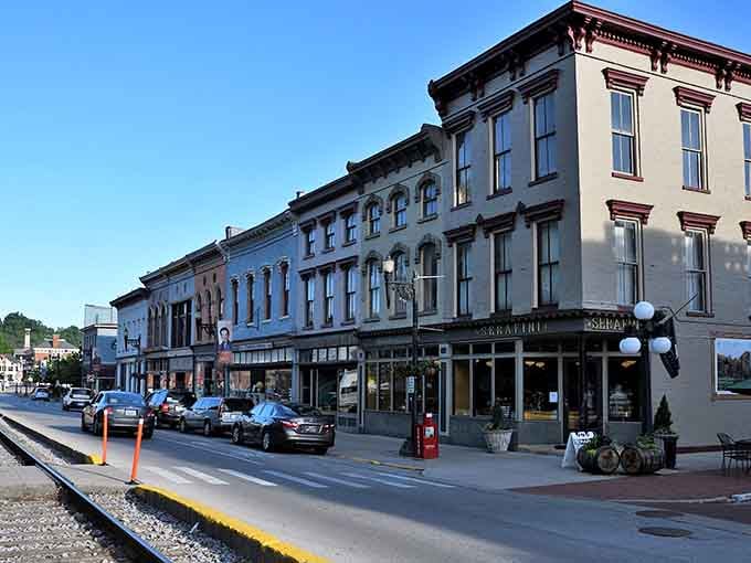 Shadows stretch across historic facades where the pace of life moves slower and nobody seems to mind.