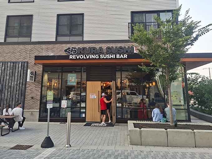 The revolving sushi bar beckons from this bright corner location, promising fresh fish and interactive dining fun.