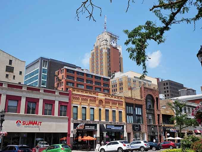 That colorful clock tower rises like a beacon saying "affordable living can still have personality and pizzazz, folks!"