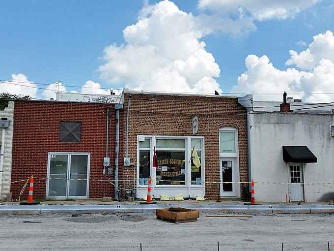 Weathered brick storefronts await their next chapter, standing as testaments to small-town resilience and character.