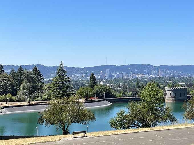 This peaceful urban oasis offers sweeping views where water, trees, and distant mountains create perfect harmony together beautifully.